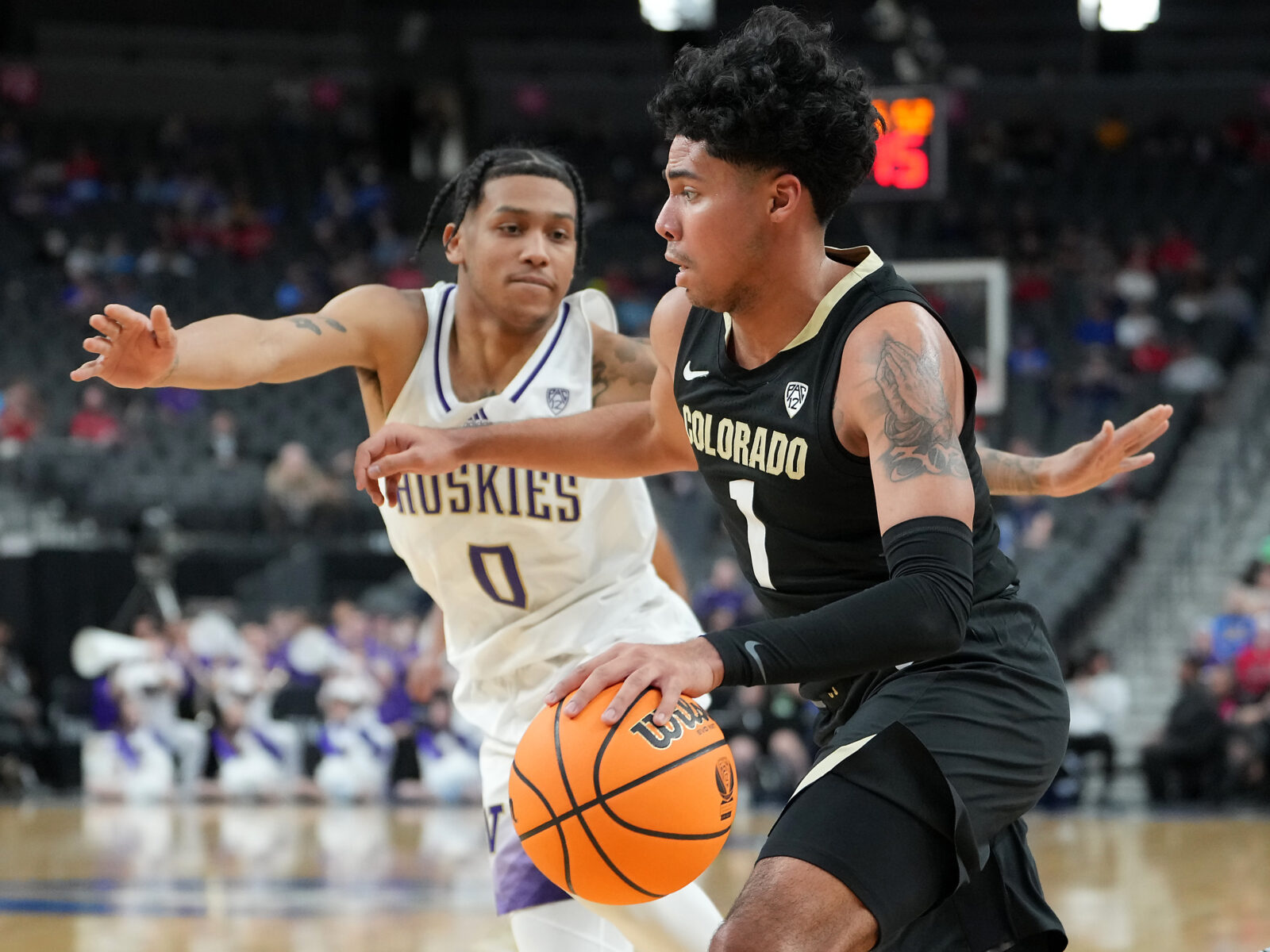 CU Buffs hang on to beat UW 74-68, set-up re-match with UCLA