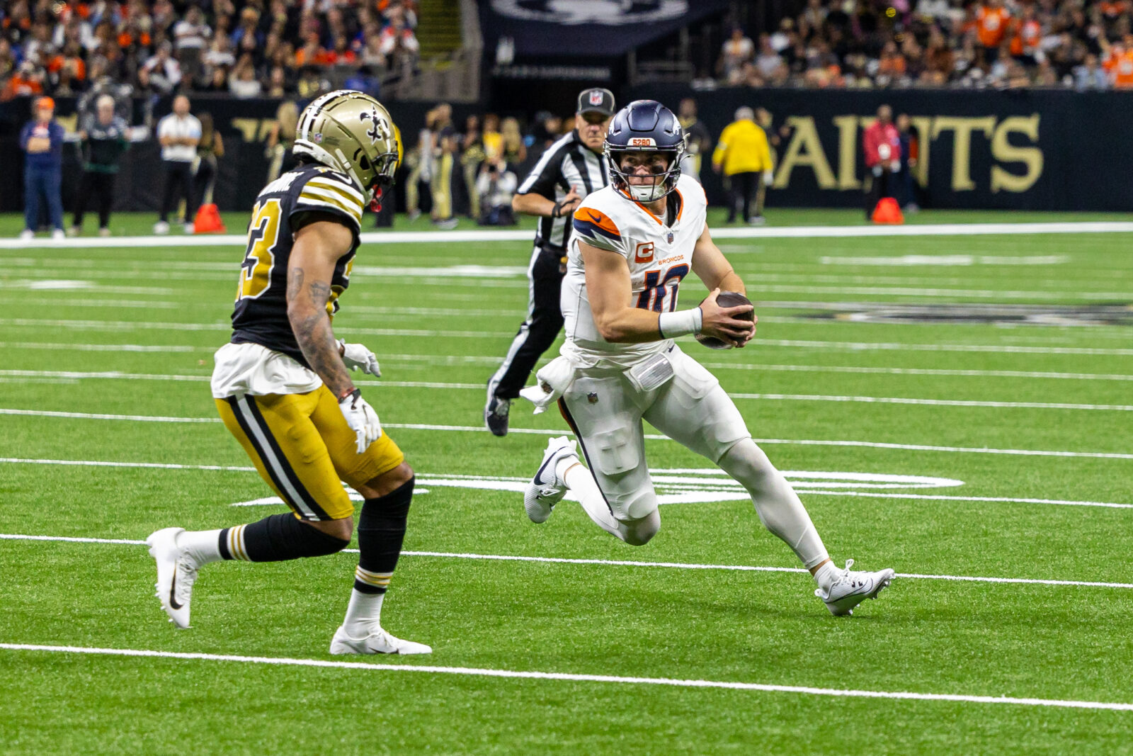 Behind a physical running attack, the Broncos beat up the Saints