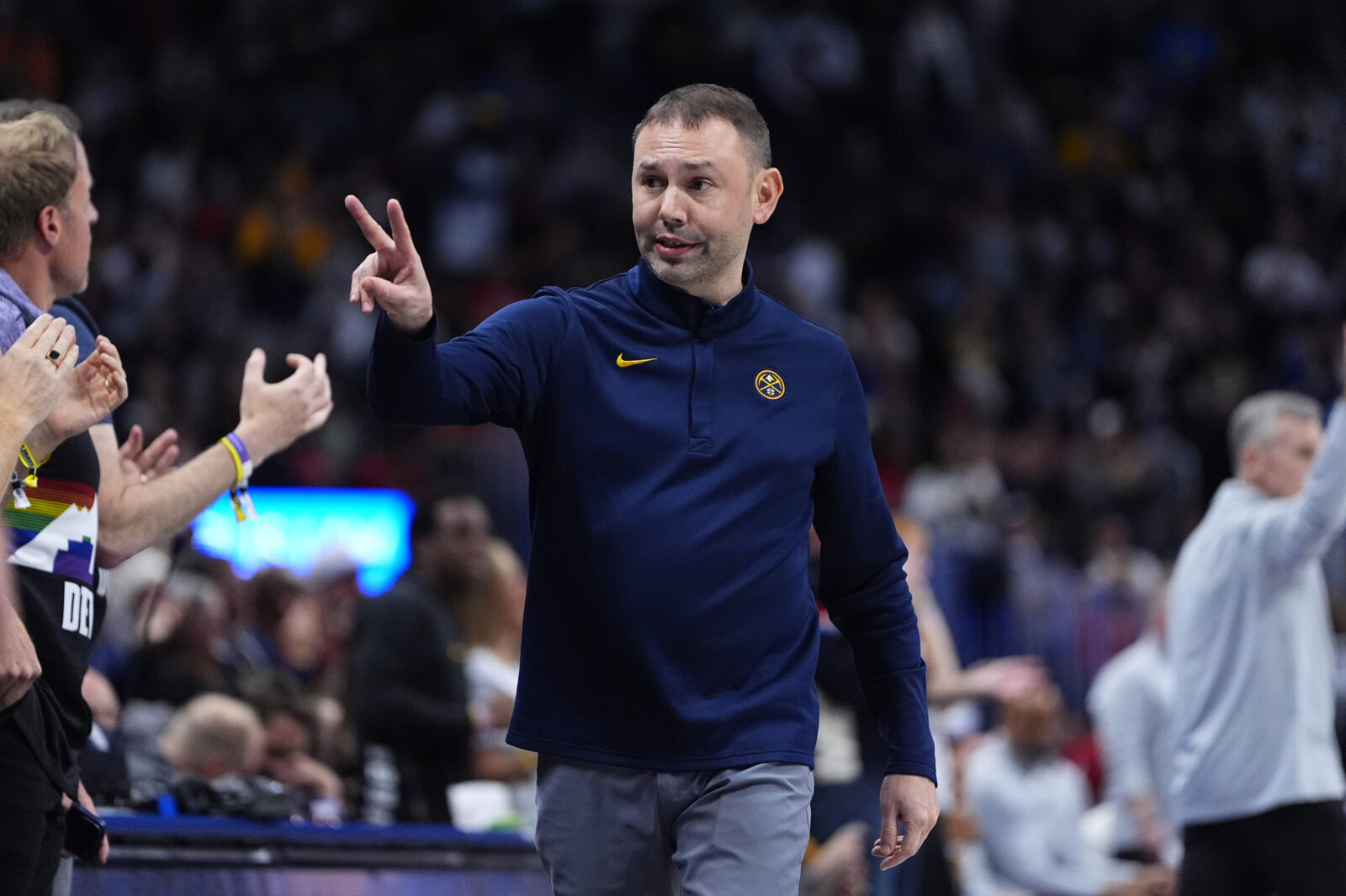 Nuggets coach David Adelman watching the clock better than most